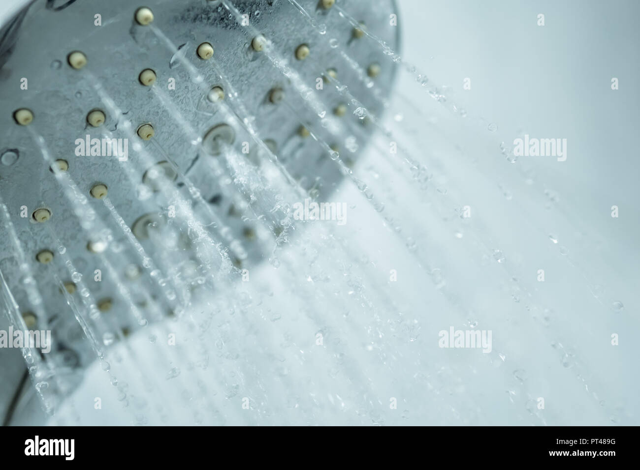 Shower head with flowing water Stock Photo - Alamy