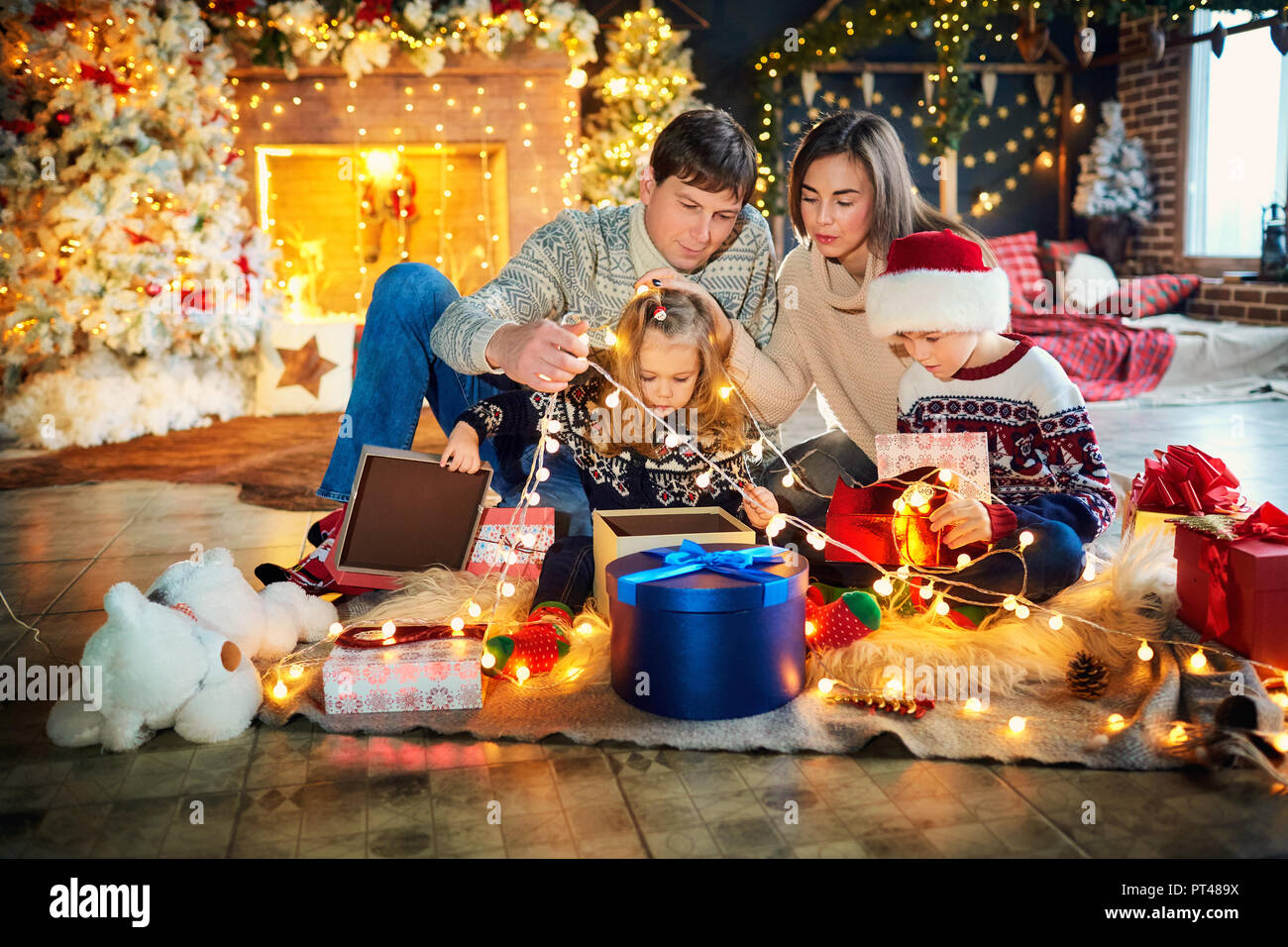 Children playing with gifts hi-res stock photography and images - Alamy