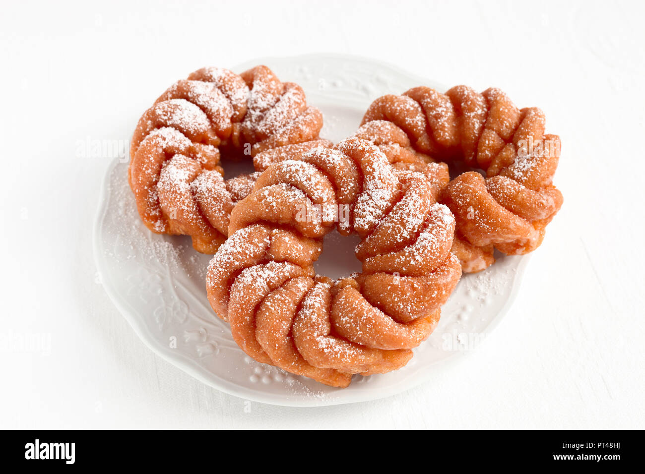 French cruller donuts Stock Photo - Alamy