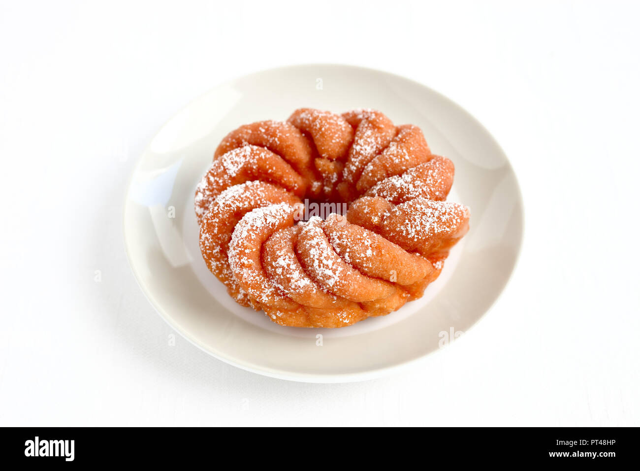 French cruller donut Stock Photo - Alamy