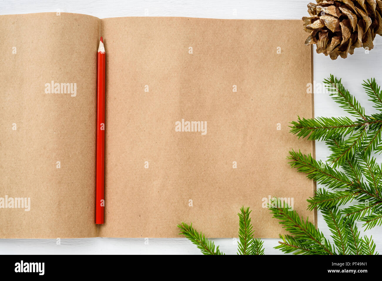 Notepad from paper craft and christmas tree on a white background Stock ...