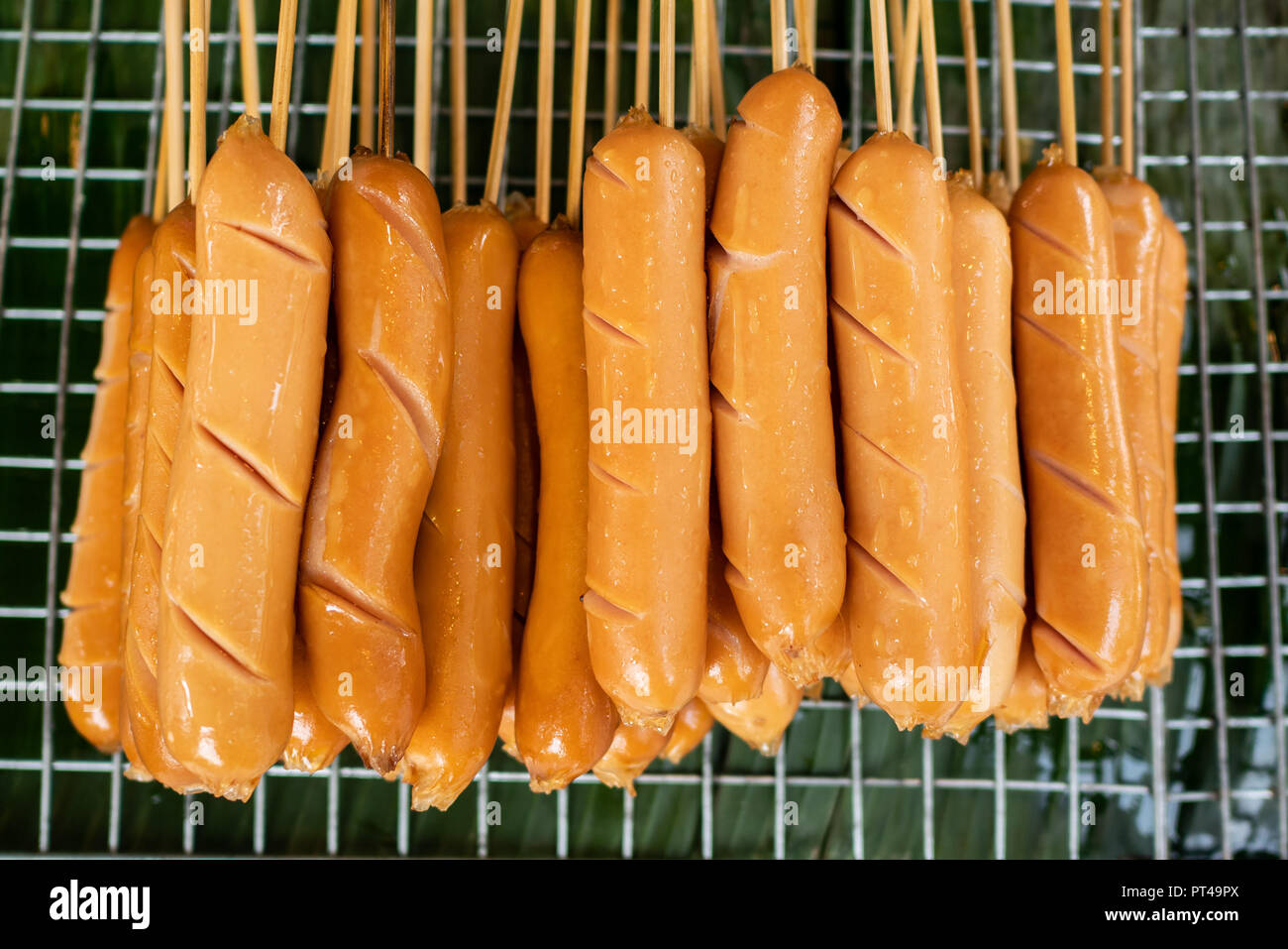 Fried sausages with stick Stock Photo - Alamy