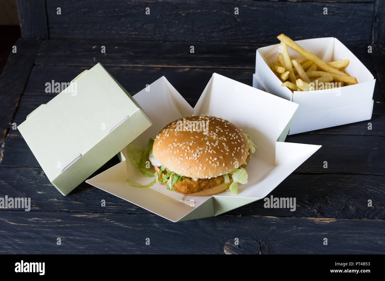 Fast food in boxes. Junk food in boxes. Front view Stock Photo - Alamy