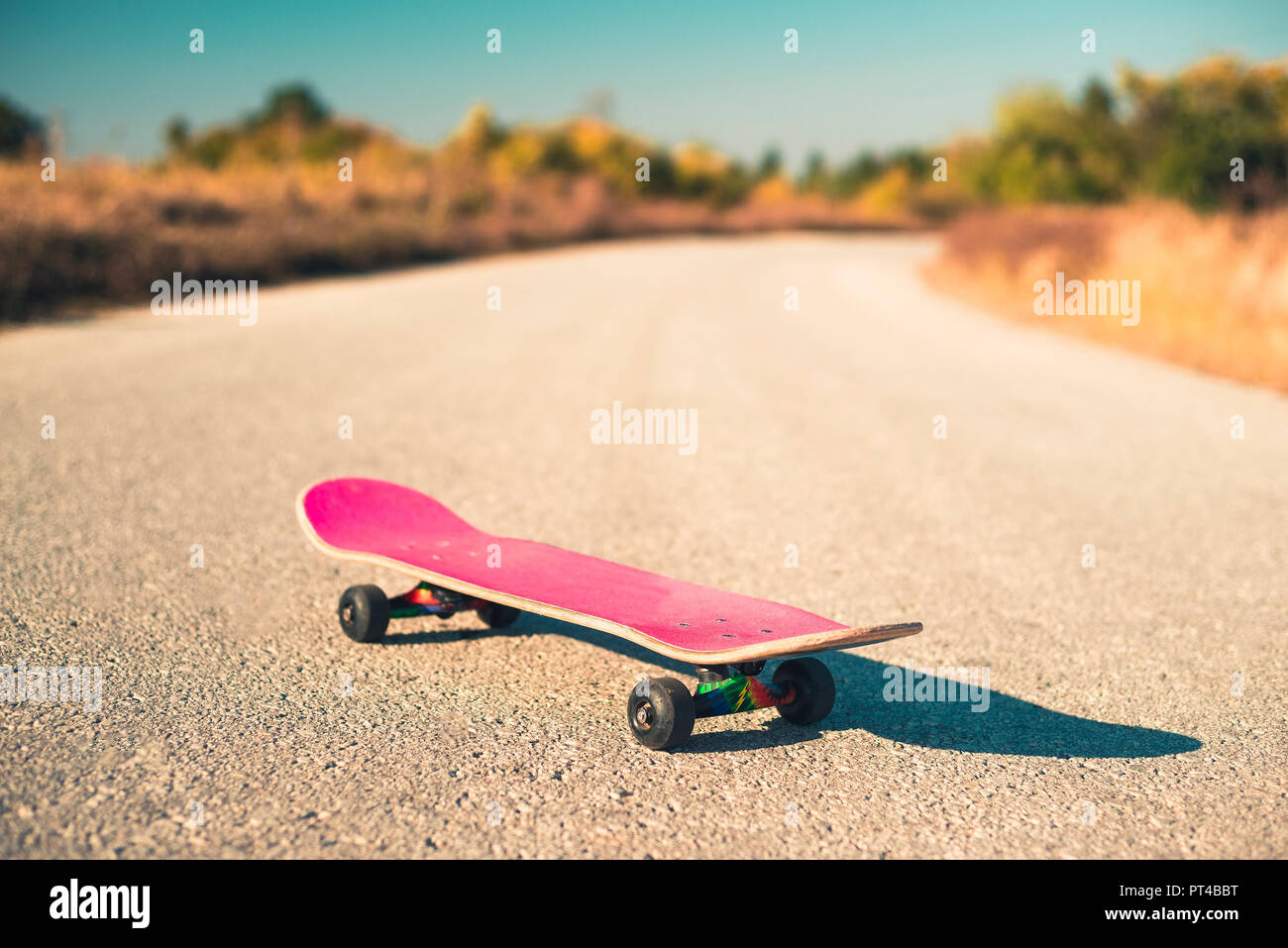 Skateboarder outside skateboarding on sunny hi-res stock photography ...