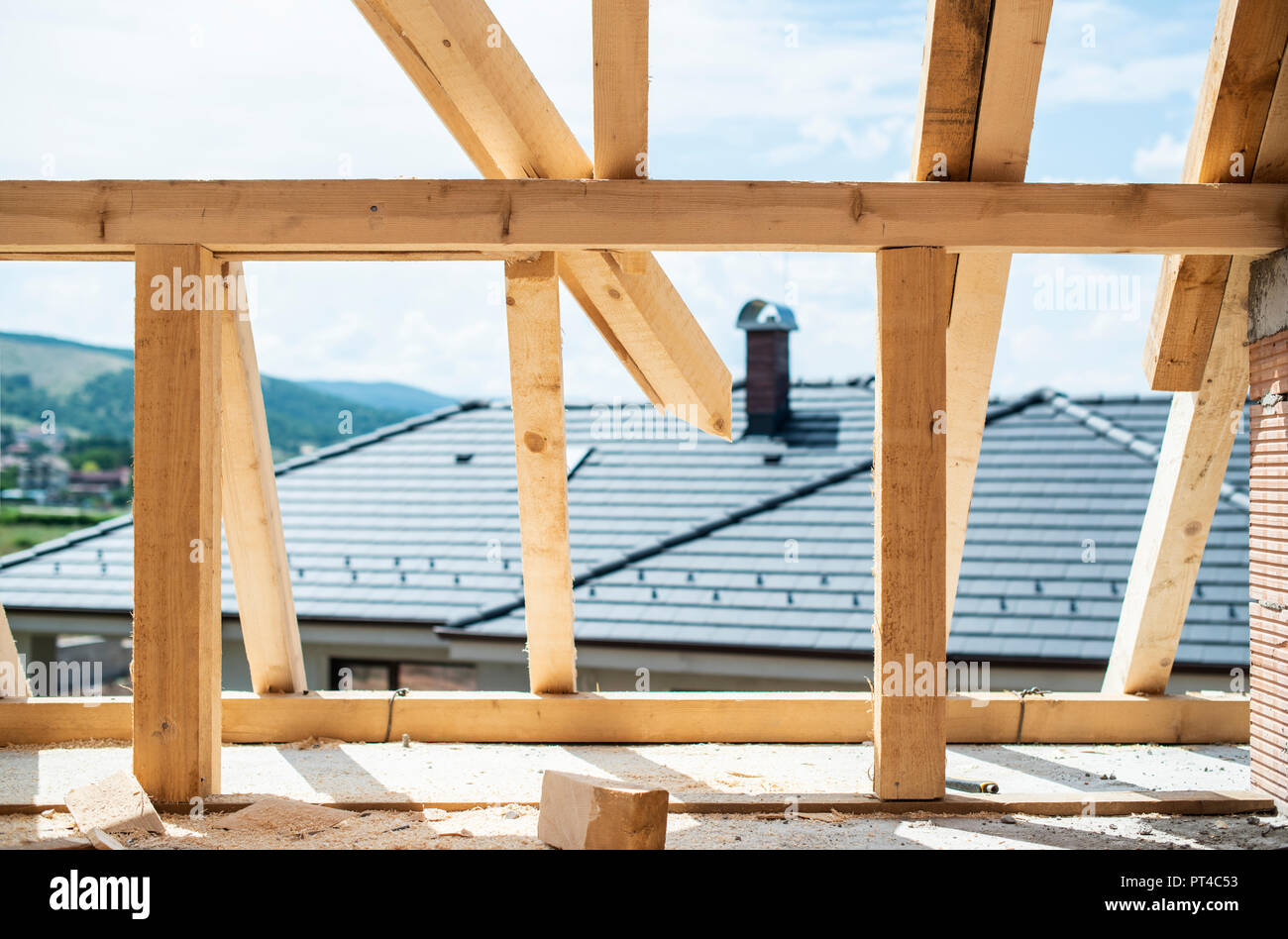 Making roof with wooden beams. Interior Stock Photo - Alamy