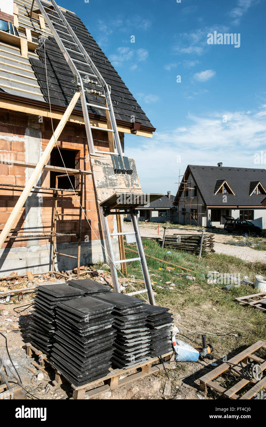 Laying roof tiles hi-res stock photography and images - Alamy