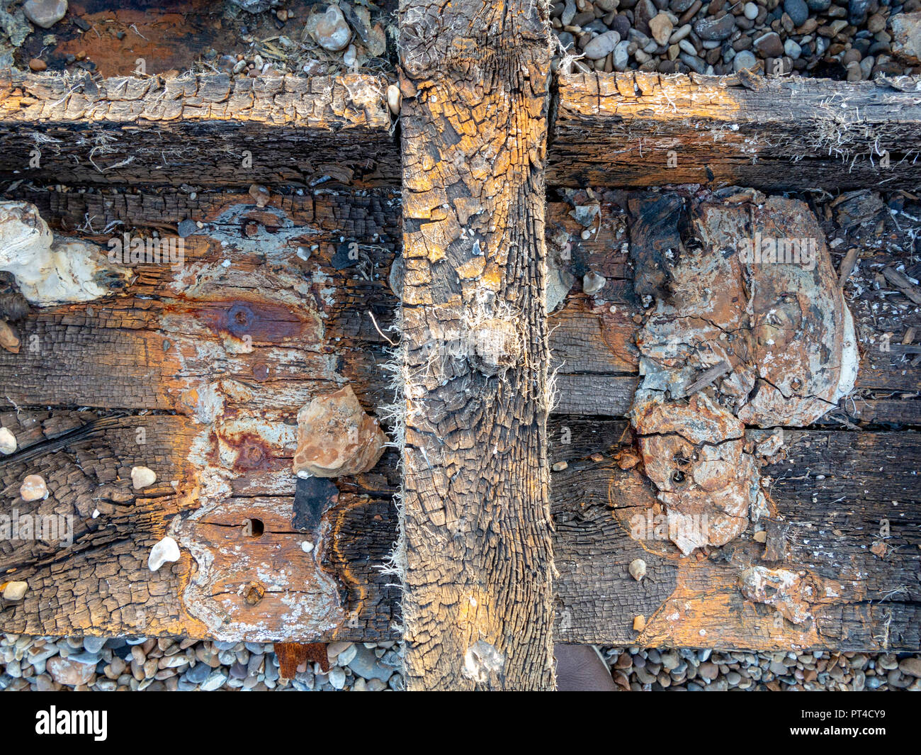 Details of marine wreckage showing colours and textures created by rust ...