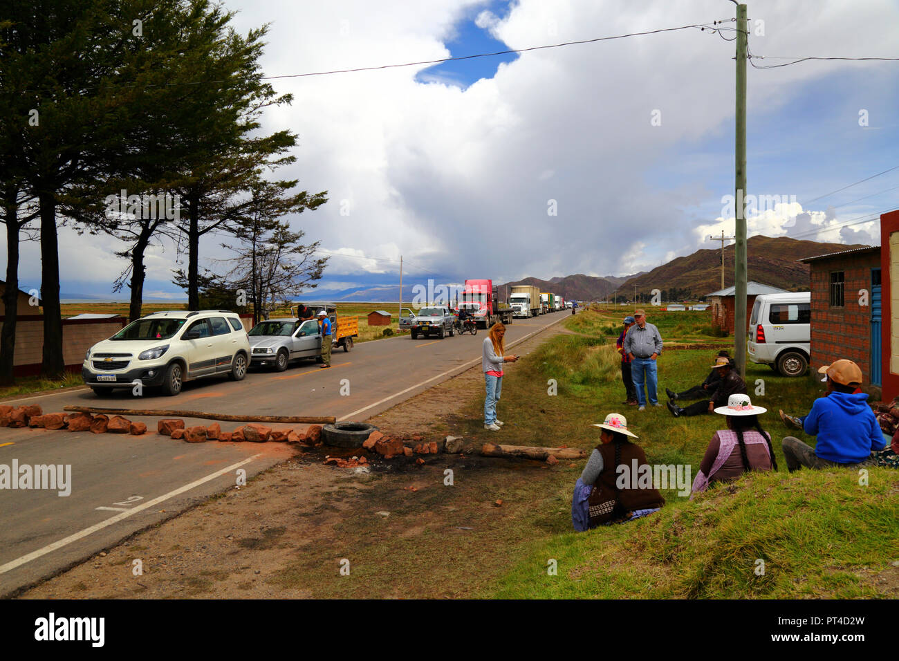 People block the main road between Puno and Desaguadero at Zepita in a ...