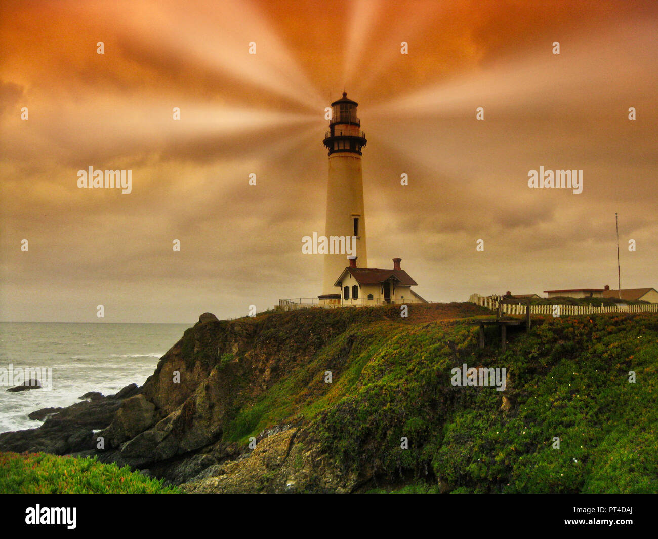 Sun rays and lighthouse Stock Photo - Alamy