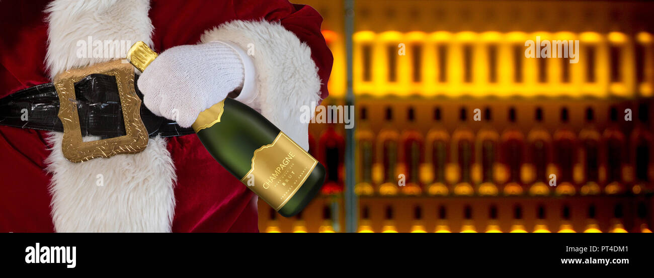Santa claus in the liquor store holding a champagne bottle with ...