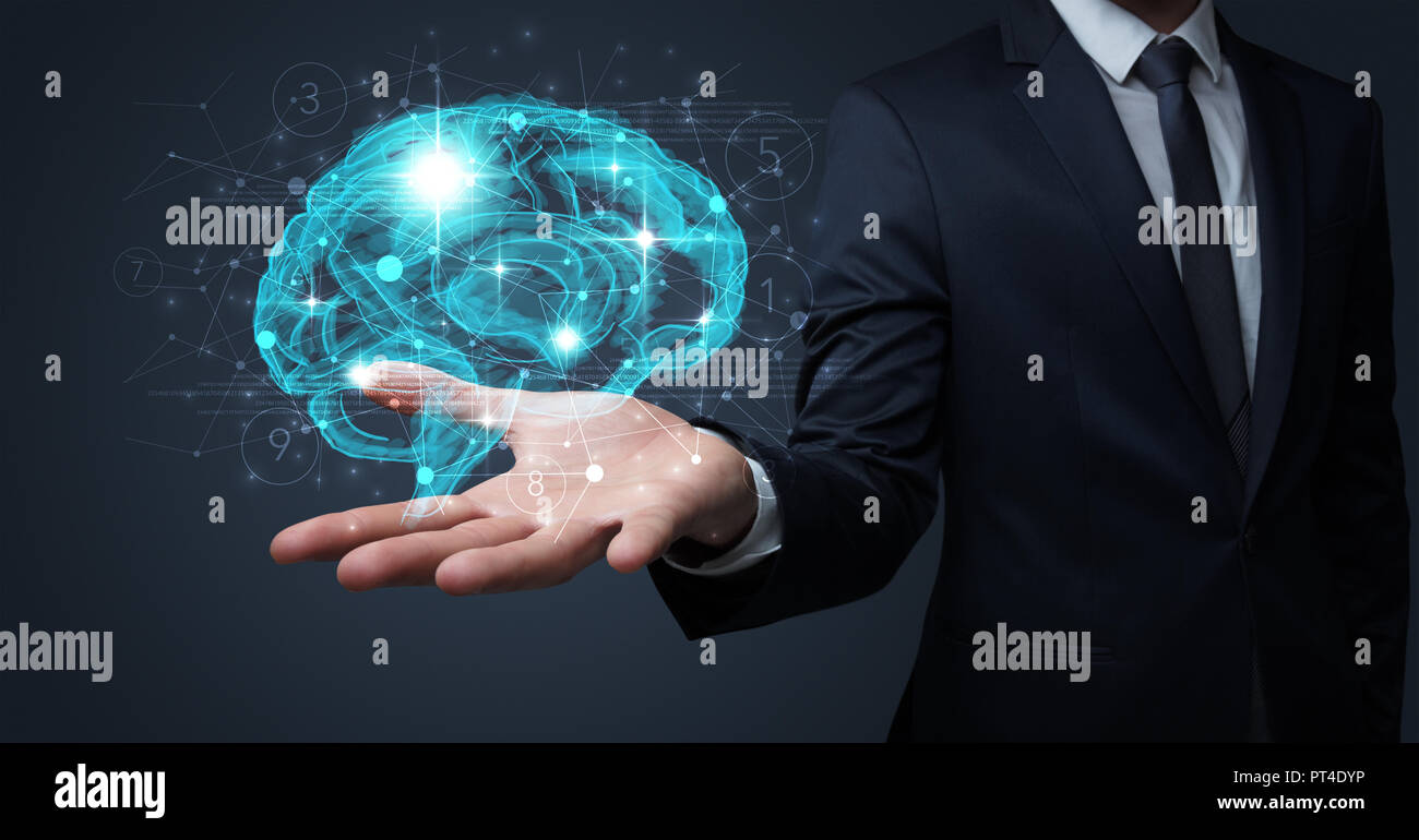 Businessman holding human brain on his hand with logistics symbols ...