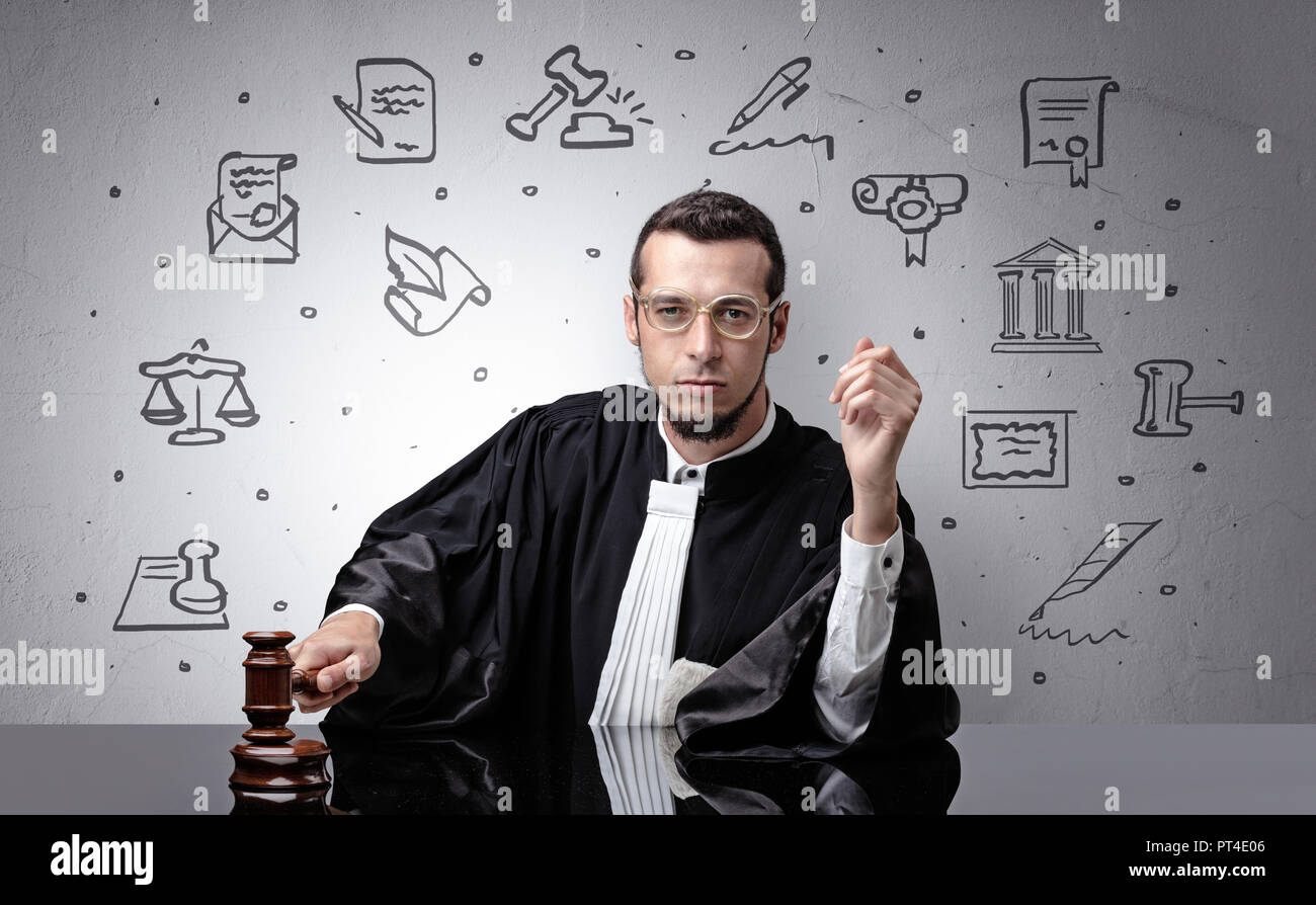 Handsome judge with court symbols around Stock Photo - Alamy