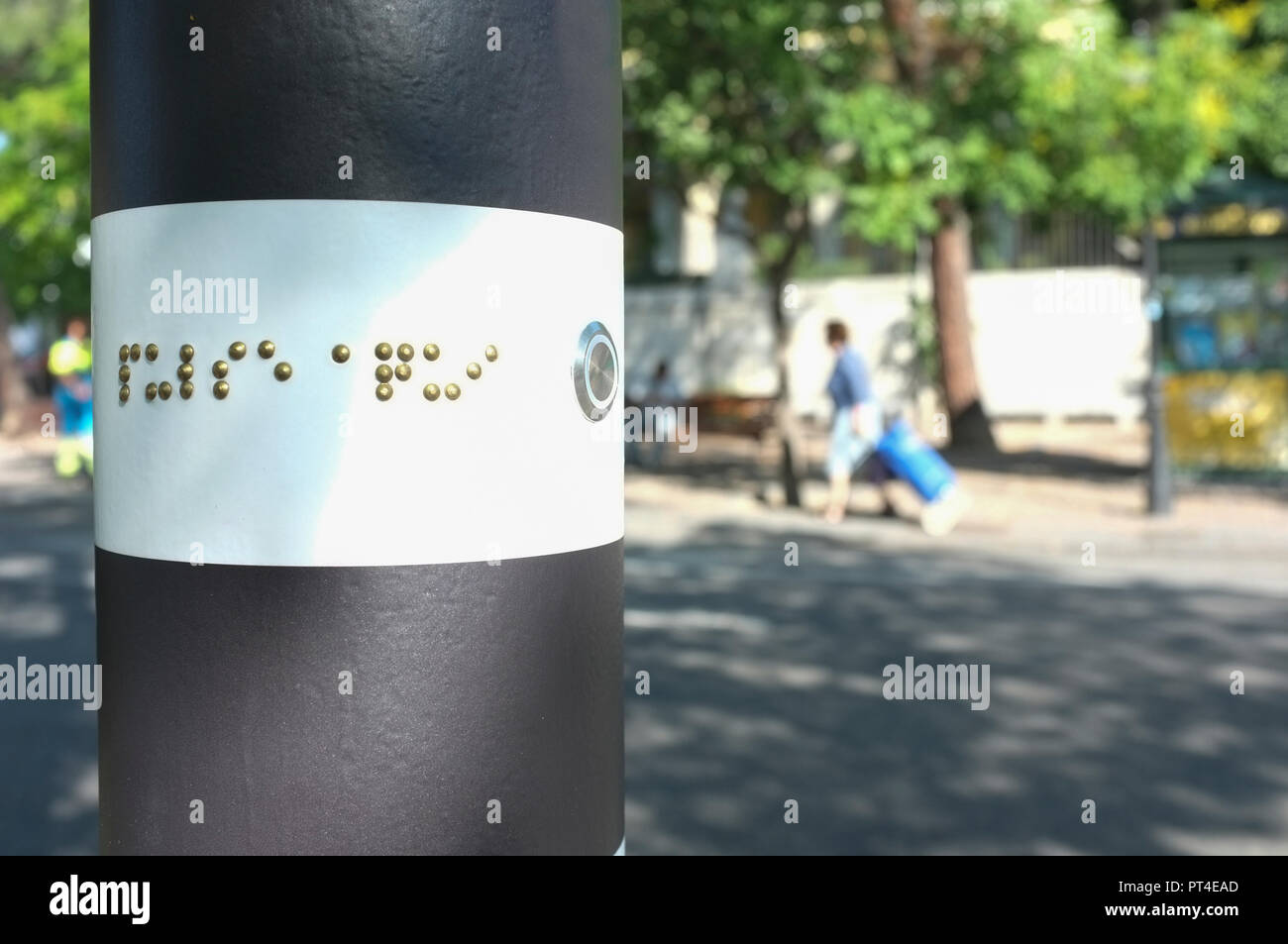 Pedestrian crossing traffic pole for blind people. Emerging lighting on ...