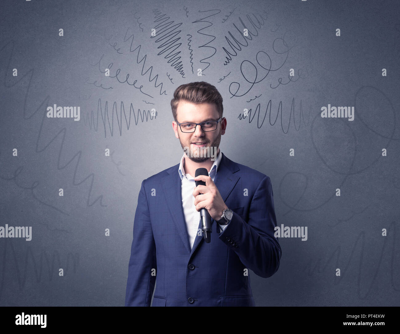 Businessman speaking into microphone with scribbles over his head Stock ...