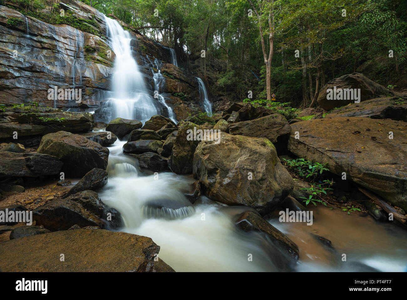 Water stream flow through the rock at Tard Mok waterfall of Chiang Mai ...