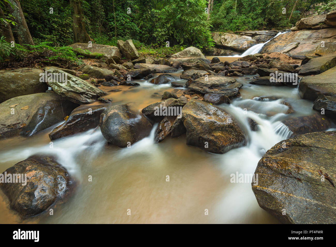 Water stream flow through the rock at Tard Mok waterfall of Chiang Mai ...
