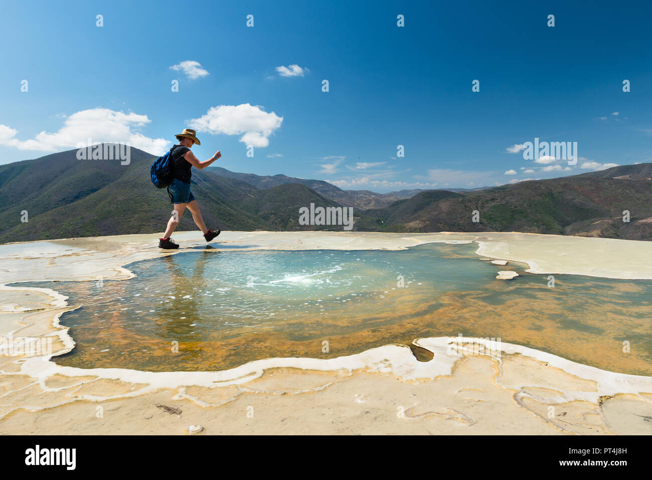 Hiker at mineral spring pool at Hierve el Agua in Oaxaca, Mexico Stock ...