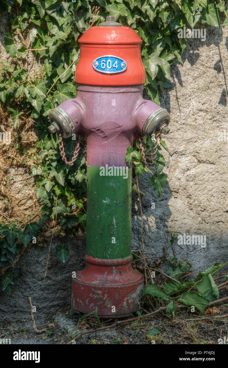 Traditional fire hydrant in Swiss alpine village of Berschis Stock ...