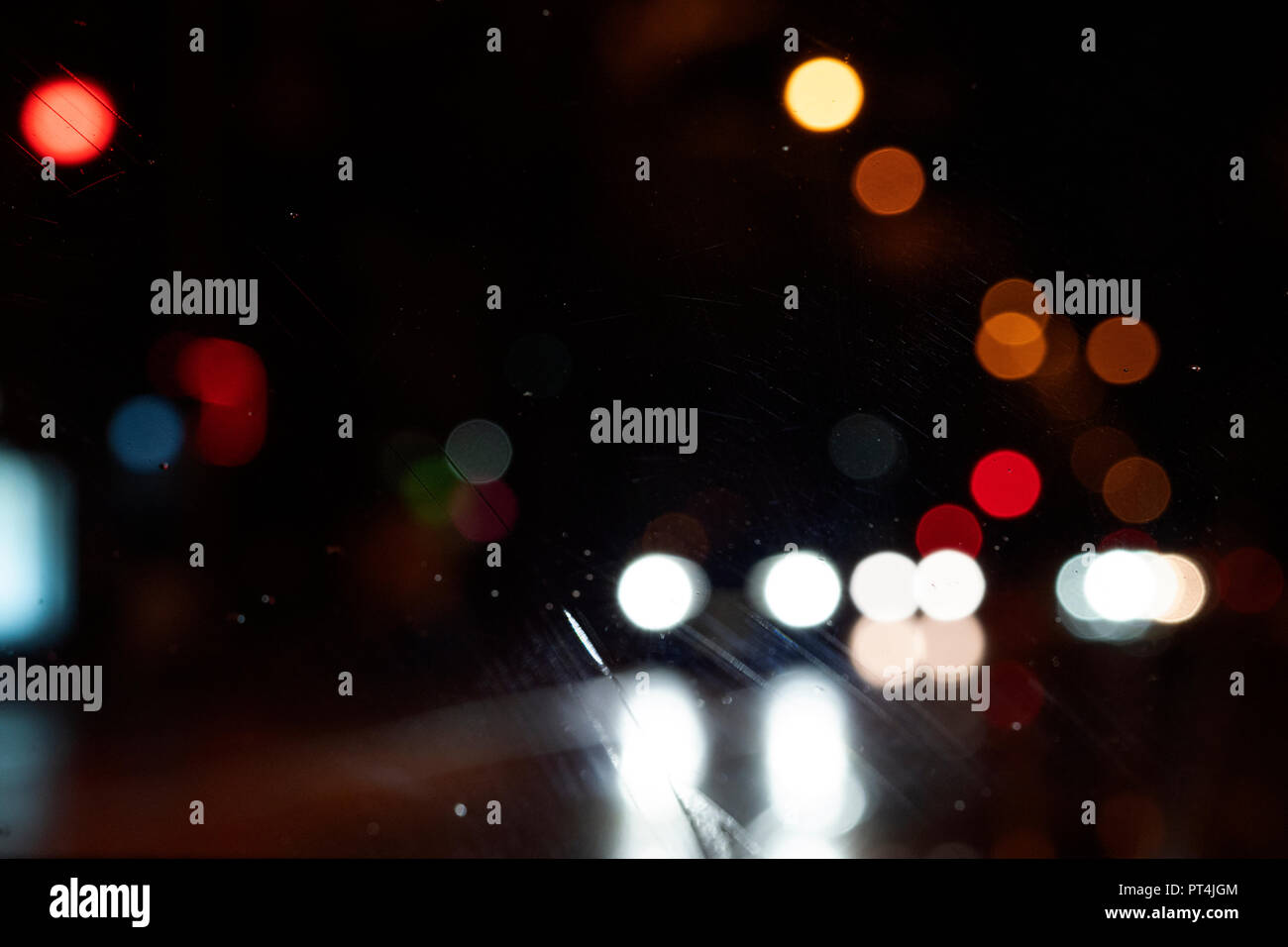 Headlights reflection on road hi-res stock photography and images - Alamy
