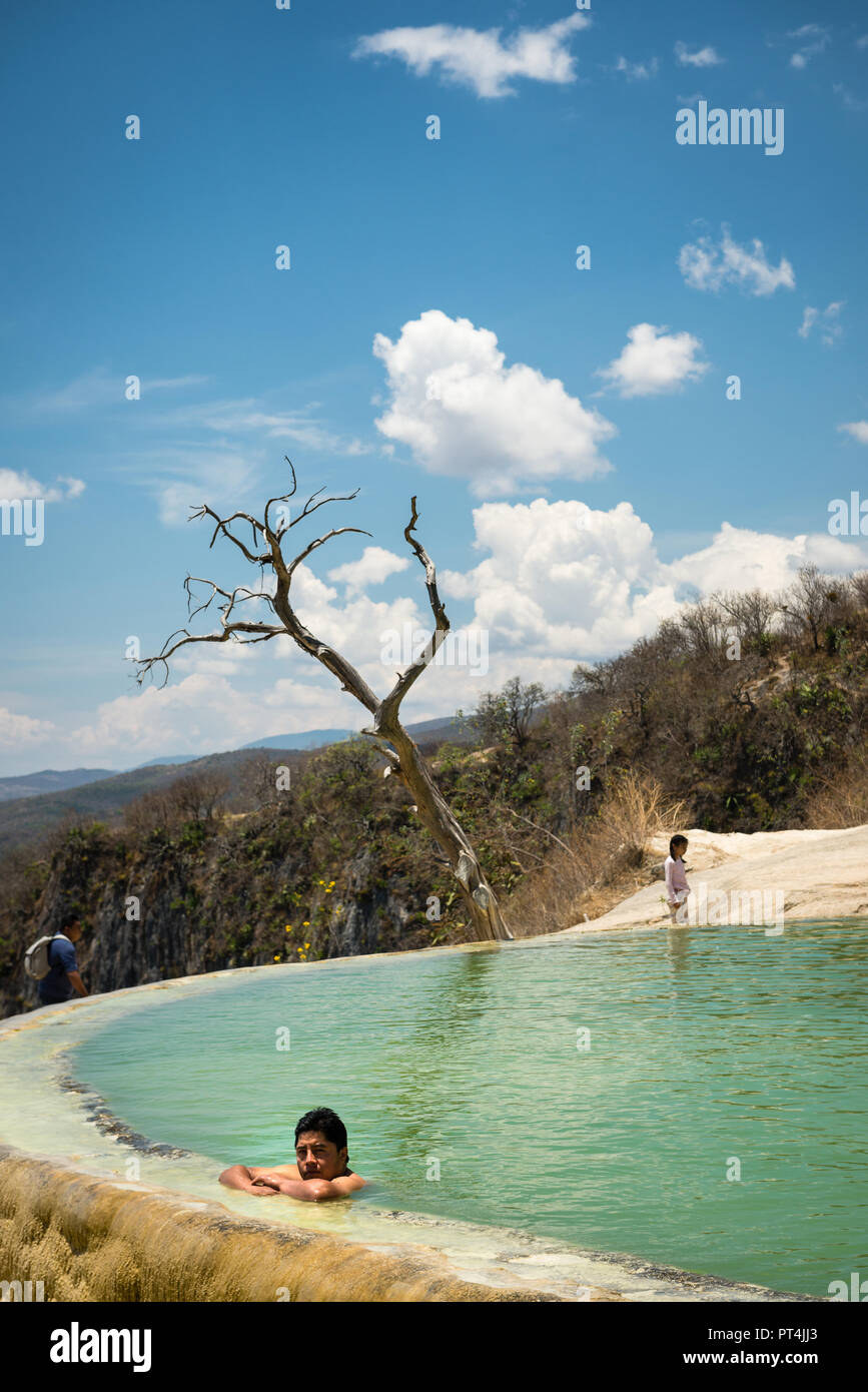 People swimming in a mineral spring pool at Hierve el Agua in Oaxaca ...