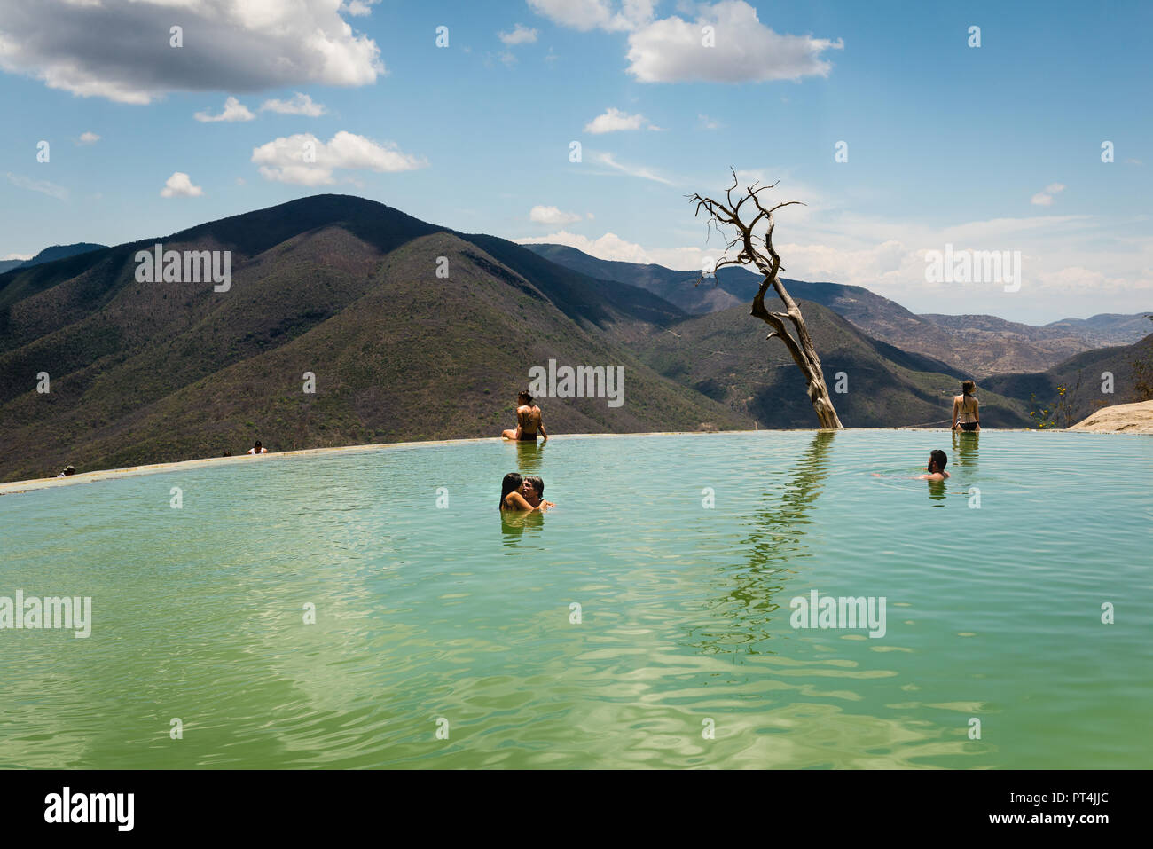 People swimming in a mineral spring pool at Hierve el Agua in Oaxaca ...