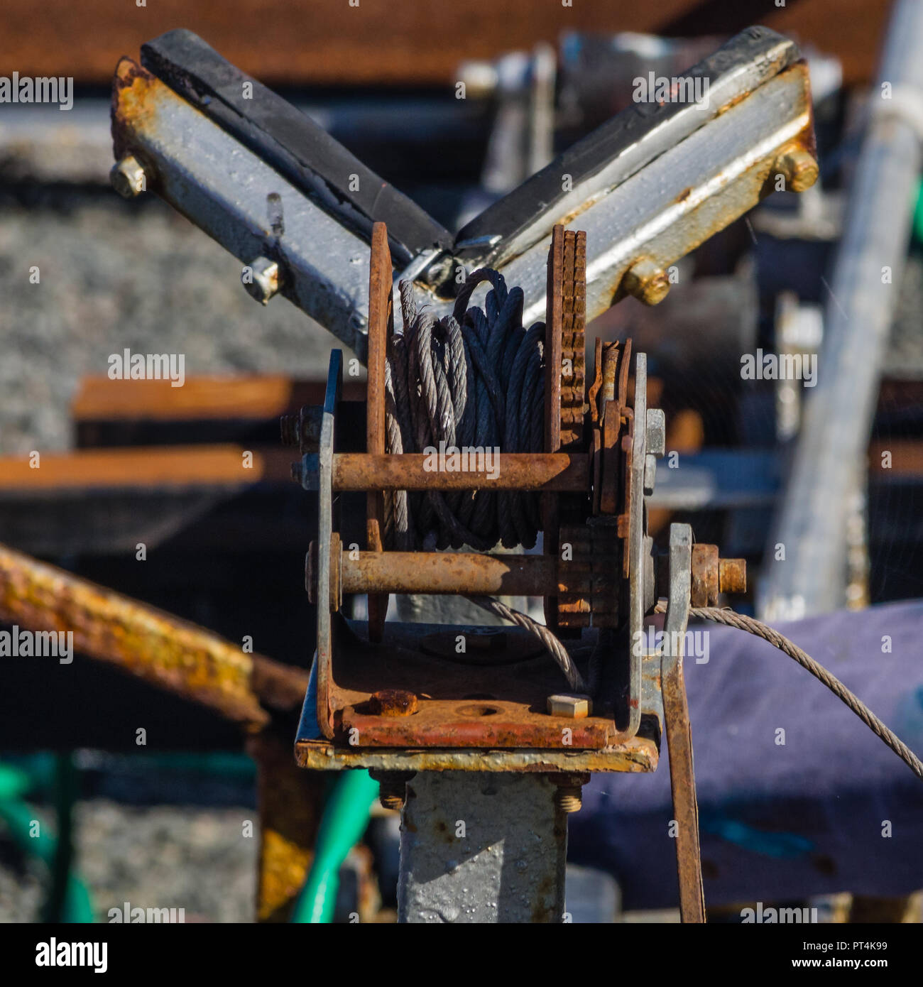 Rusty old boat winch Stock Photo - Alamy