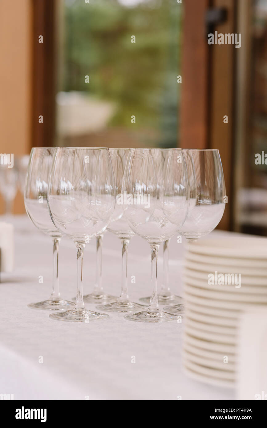 Table with ware for a buffet reception on a terrace of restaurant. Much ...