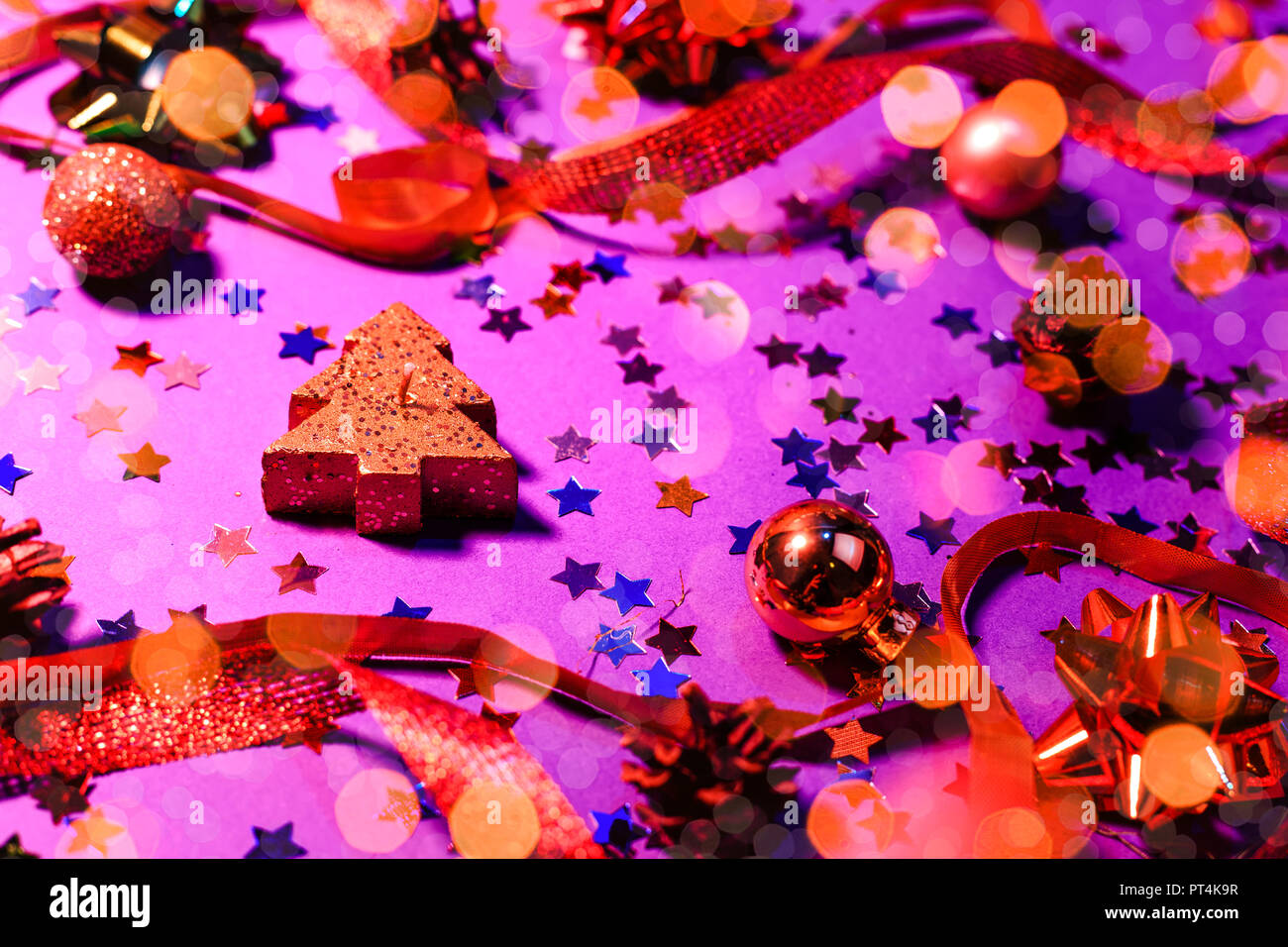 Christmas setup background with bauble ,confetti, candle tree ...