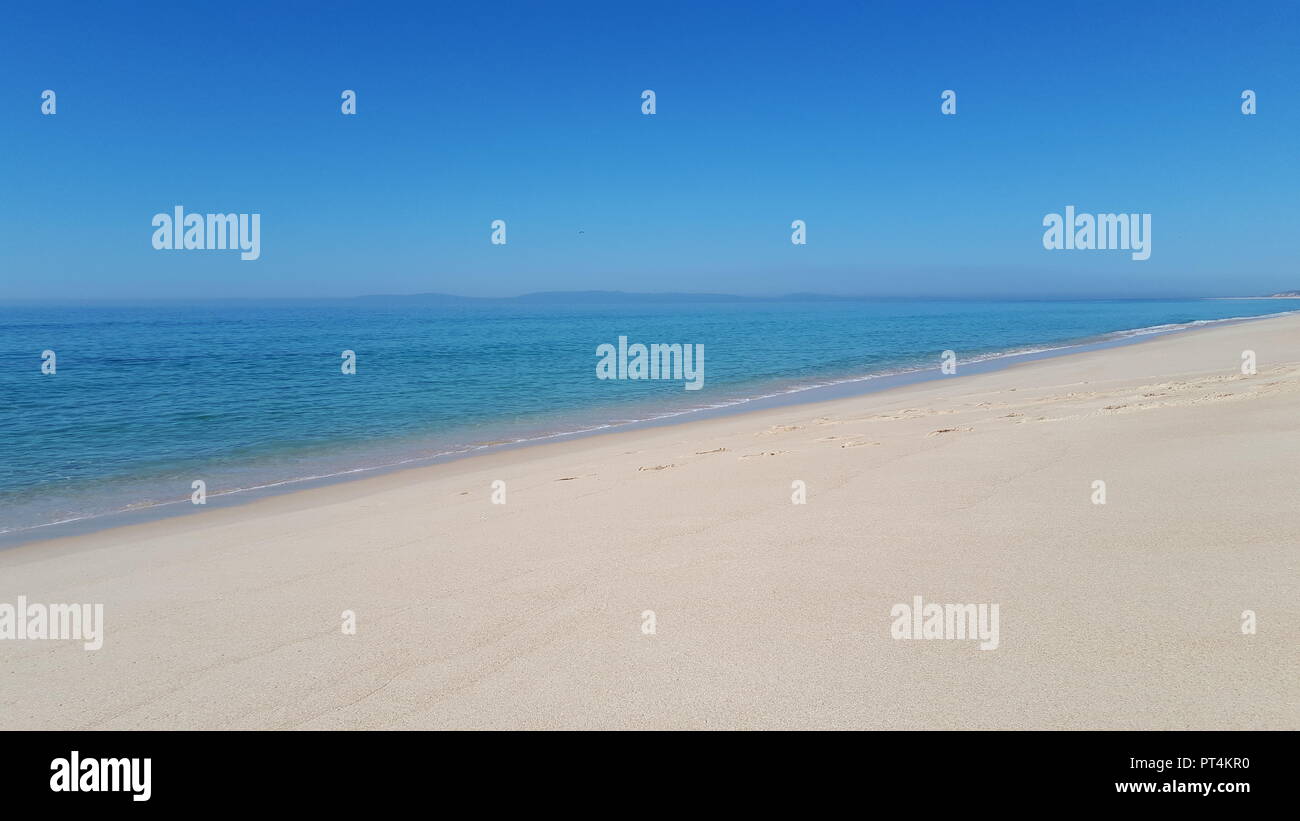 The placid Atlantic Alentejo coast in the Comporta region of Portugal ...