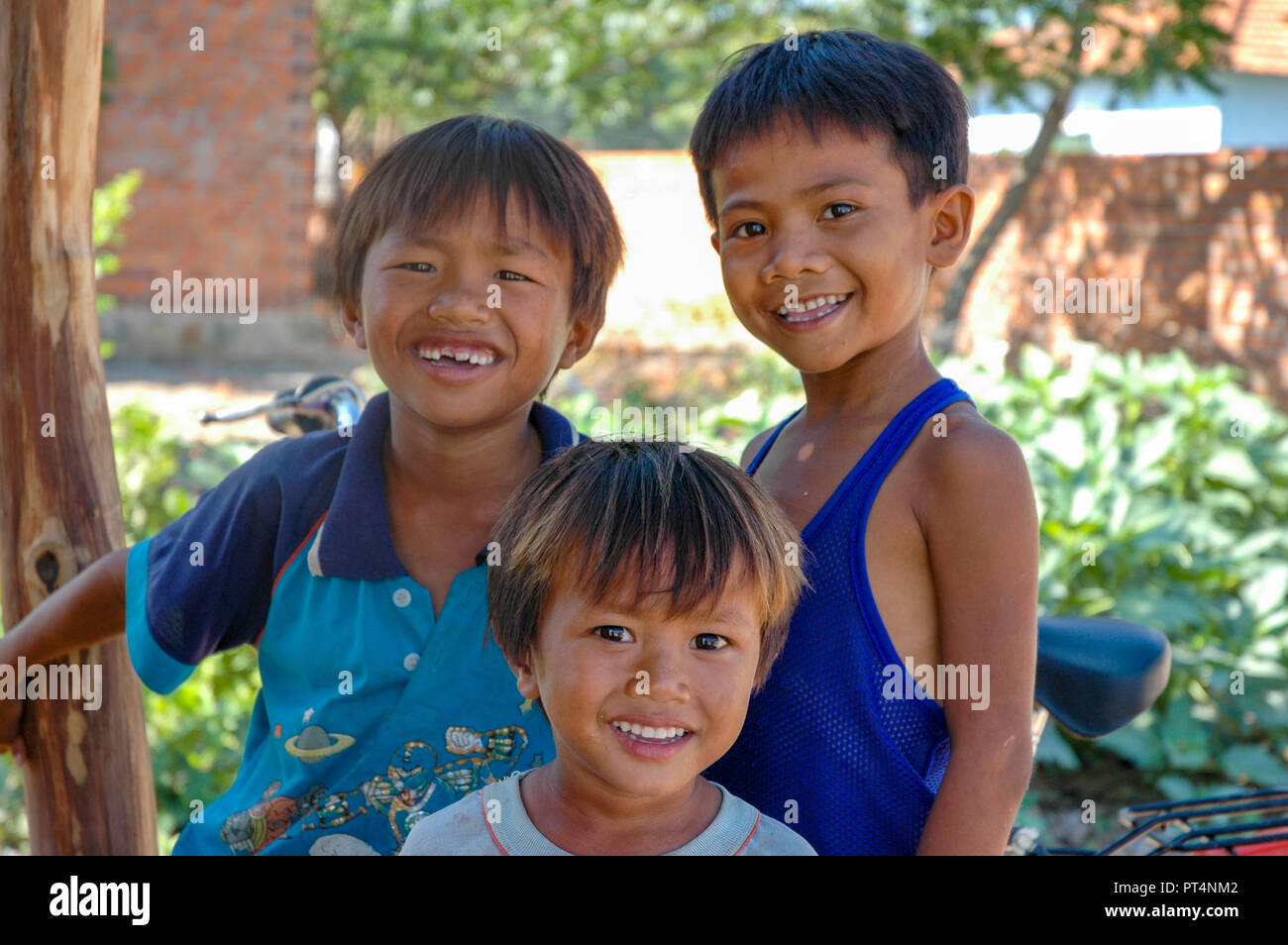 Phan Rang, Vietnam - October 1 2005. Cheerful Cham boys in village near ...