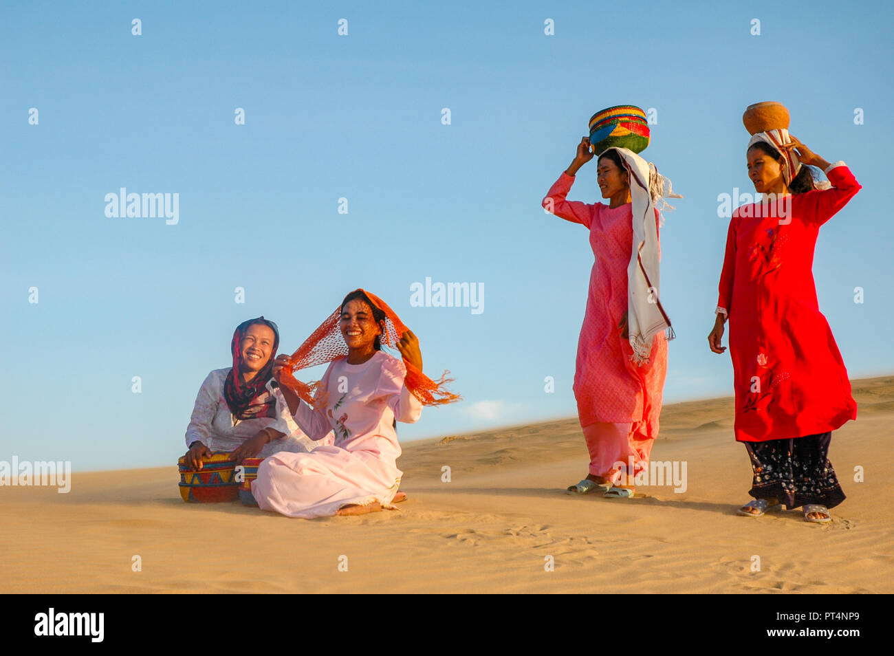 Phan Rang, Vietnam - October 1, 2005. Cham women in traditional dress ...