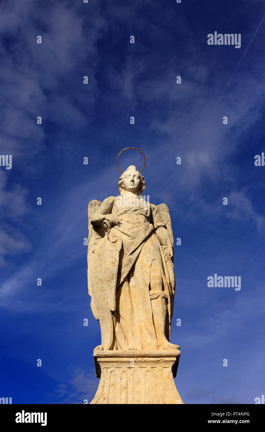 Historical statue of the Archangel Raphael, patron saint of Cordoba. It ...