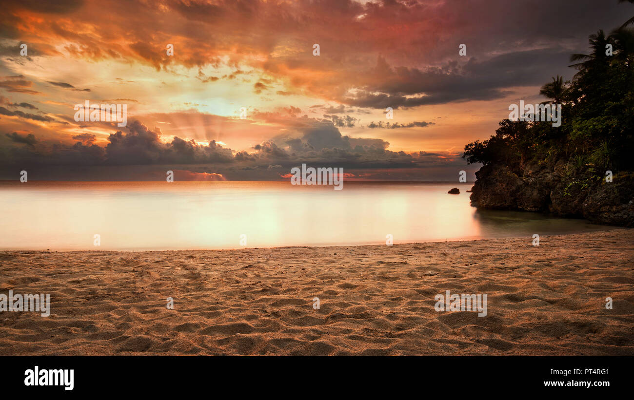 sunset on beach with dramatic clouds after a thunder storm in Cebu ...