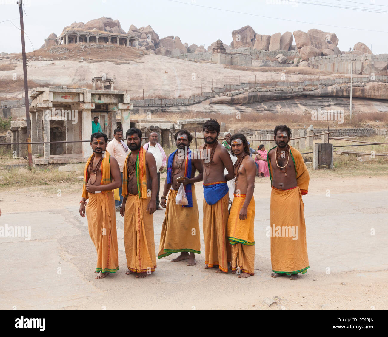 male pilgrims visiting Hampi, Karnataka, India Stock Photo - Alamy
