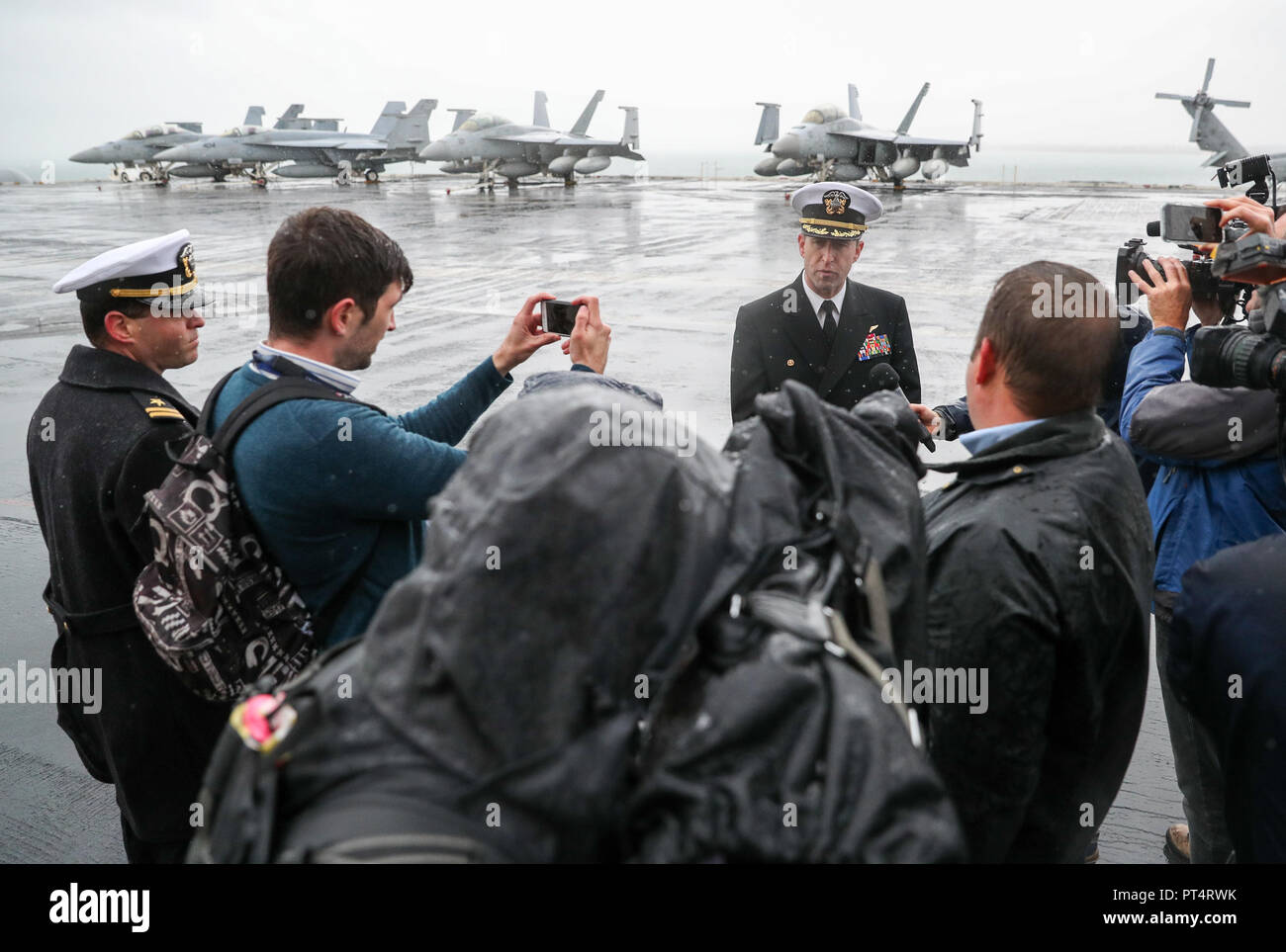 Captain Nicholas J. Dienna, Commanding Officer of the US Nimitz-class ...