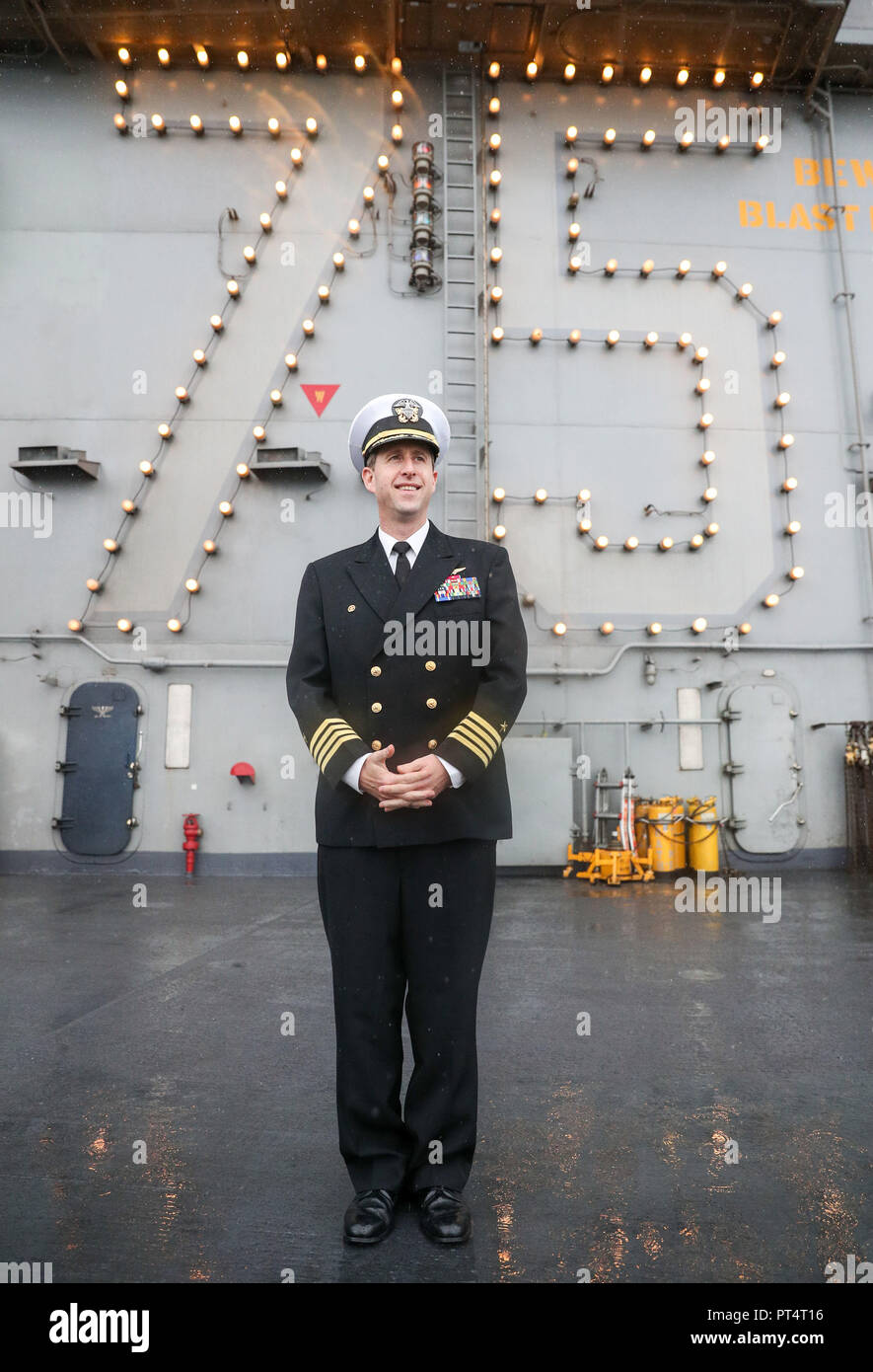 Captain Nicholas J. Dienna, Commanding Officer of the US Nimitz-class ...
