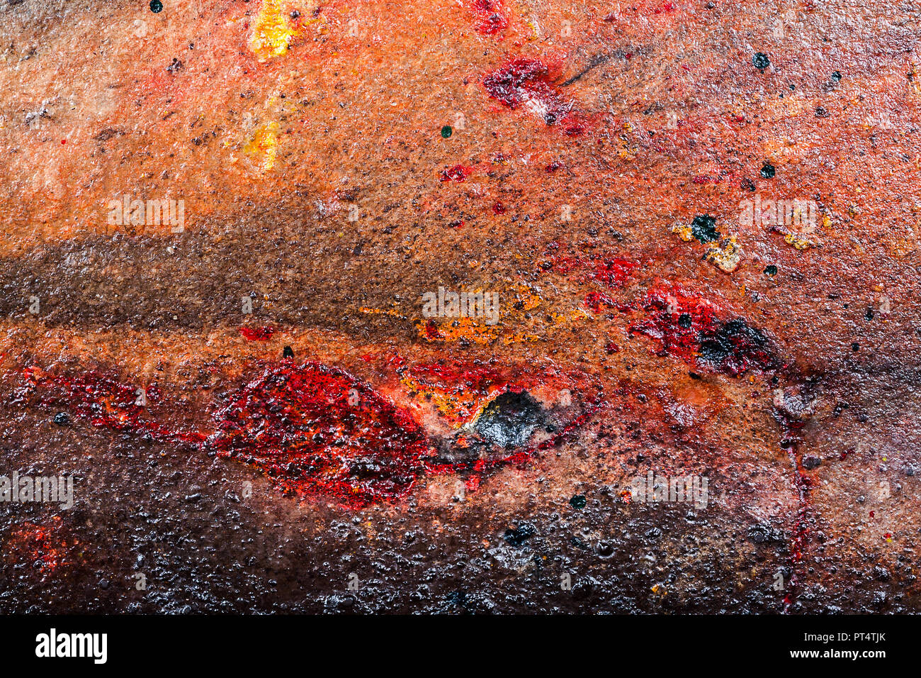 Yellow brown and red messy wall stucco texture background. Decorative ...