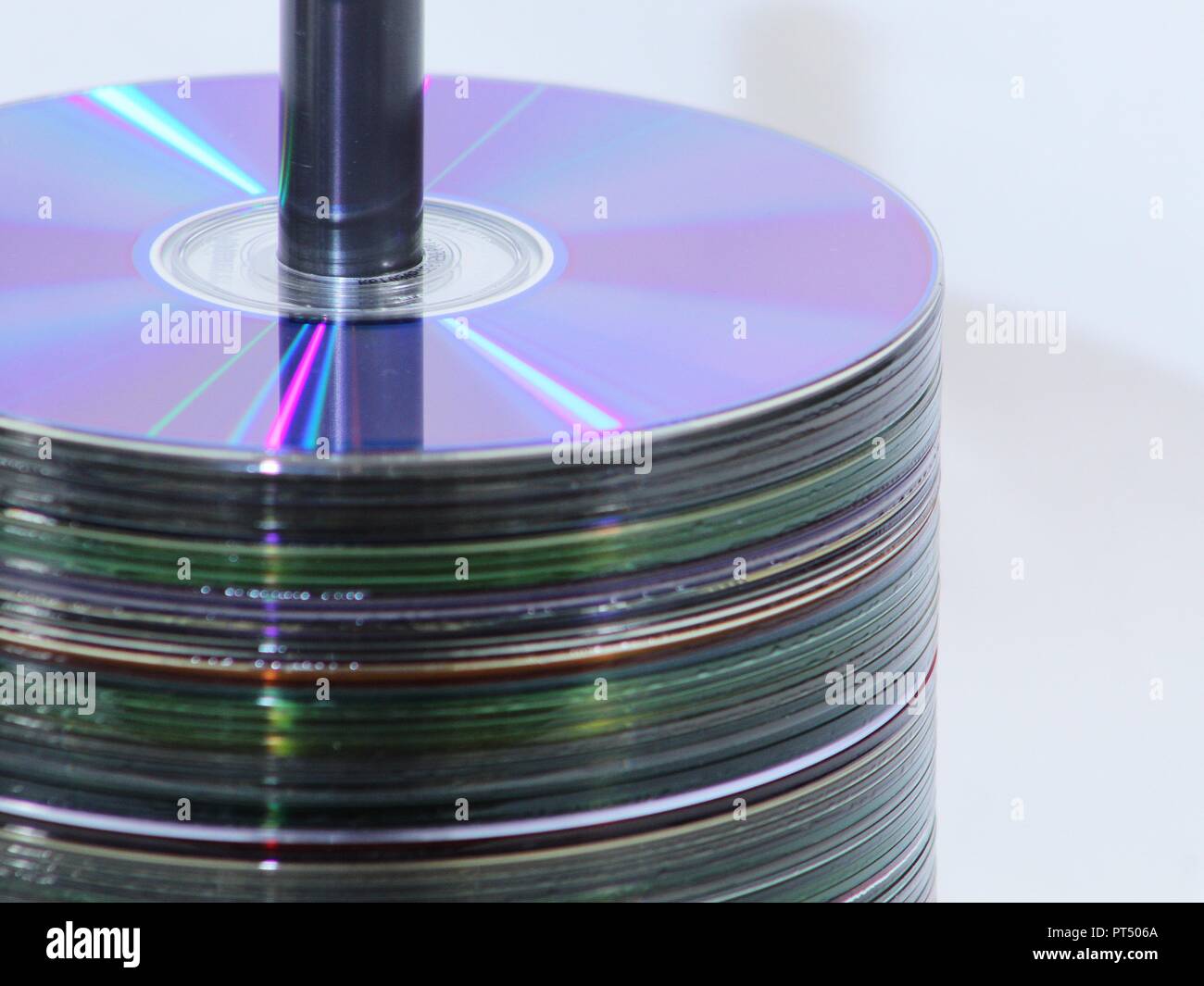 Spool of CD's stacked on the left side of the frame Stock Photo - Alamy