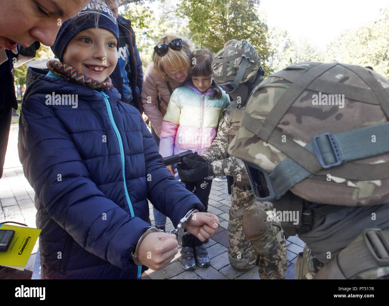 Child handcuffs hi-res stock photography and images - Alamy