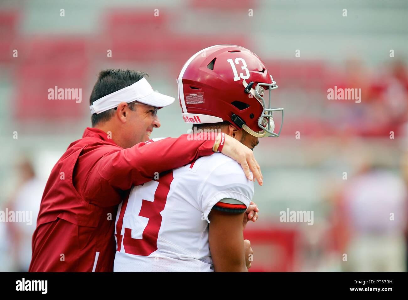 Oct 6, 2018: Too Tagovailoa #13 and QB Coach Dan Enos share a ...