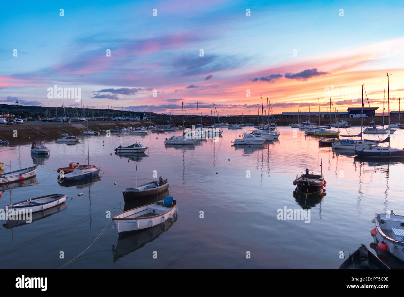 Colourful sunrise over harbour penzance credit hi-res stock photography ...