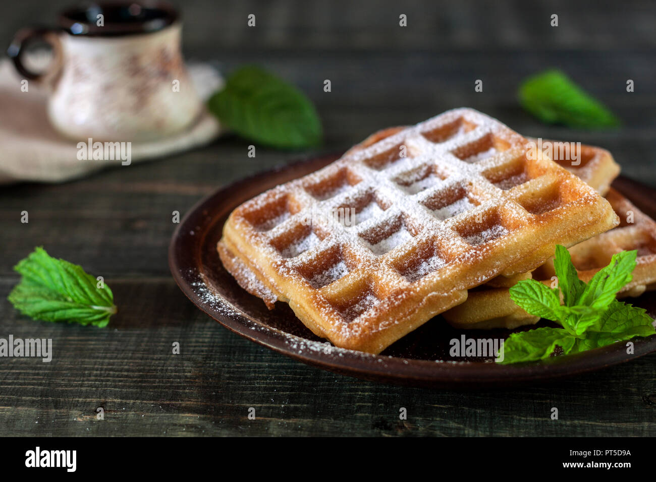 Viennese and Belgian waffles with honey Stock Photo - Alamy