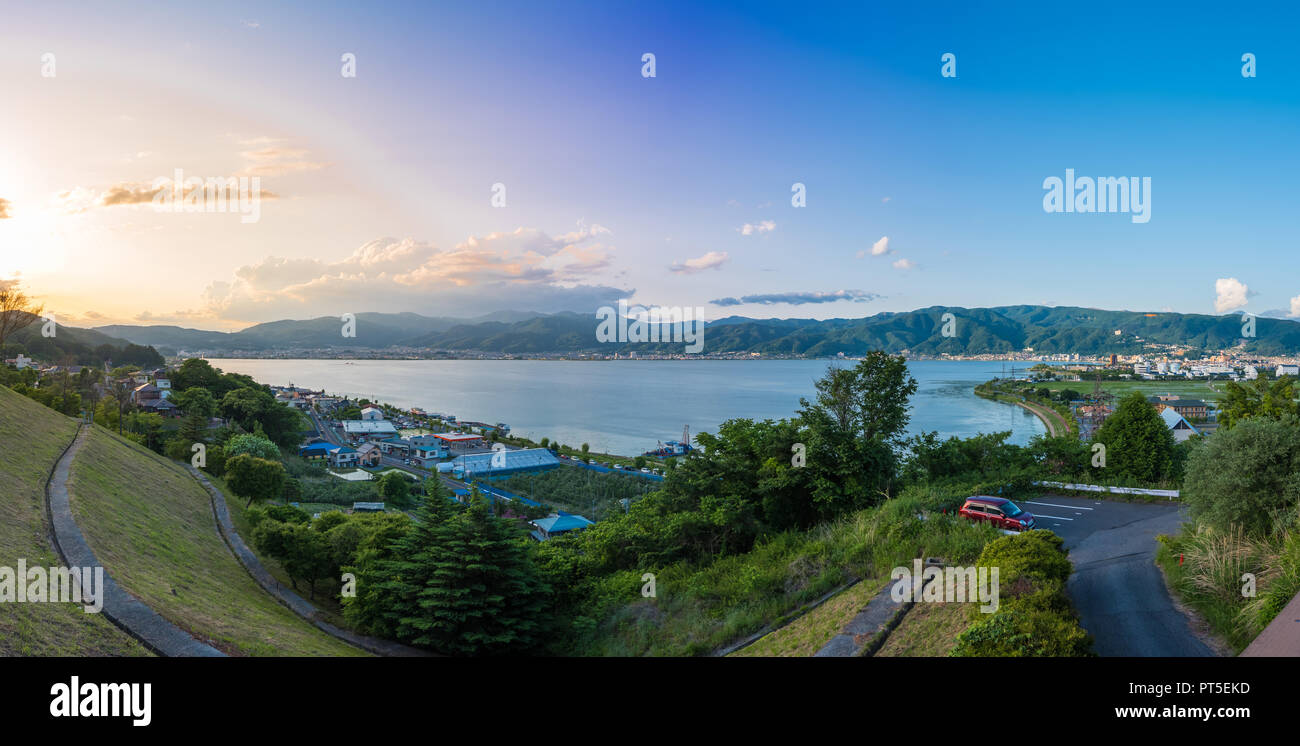 Panorama view of Suwa lake in Nagano, Japan in sunset time with city ...
