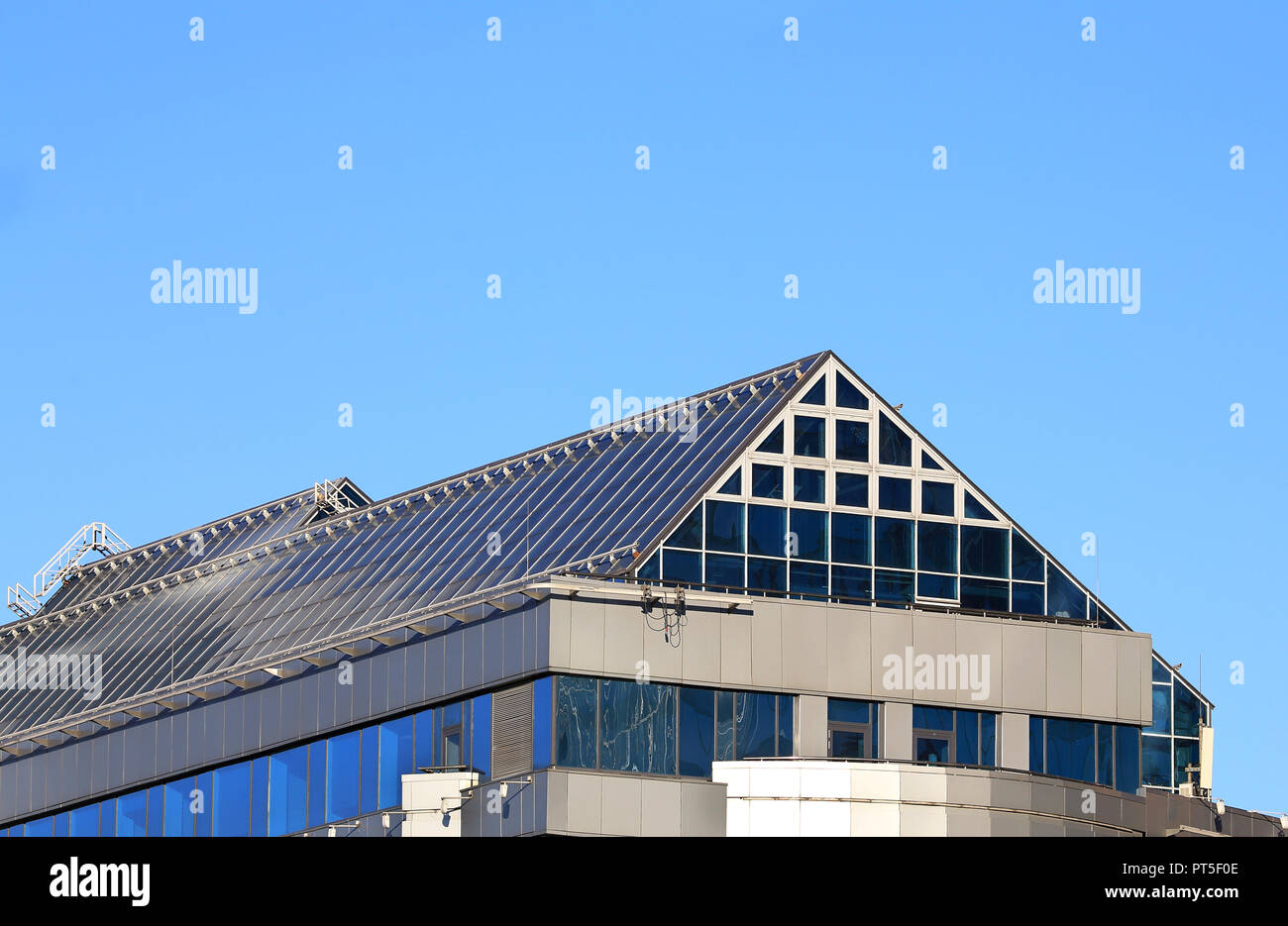 Top of huge building in a futuristic style Stock Photo - Alamy