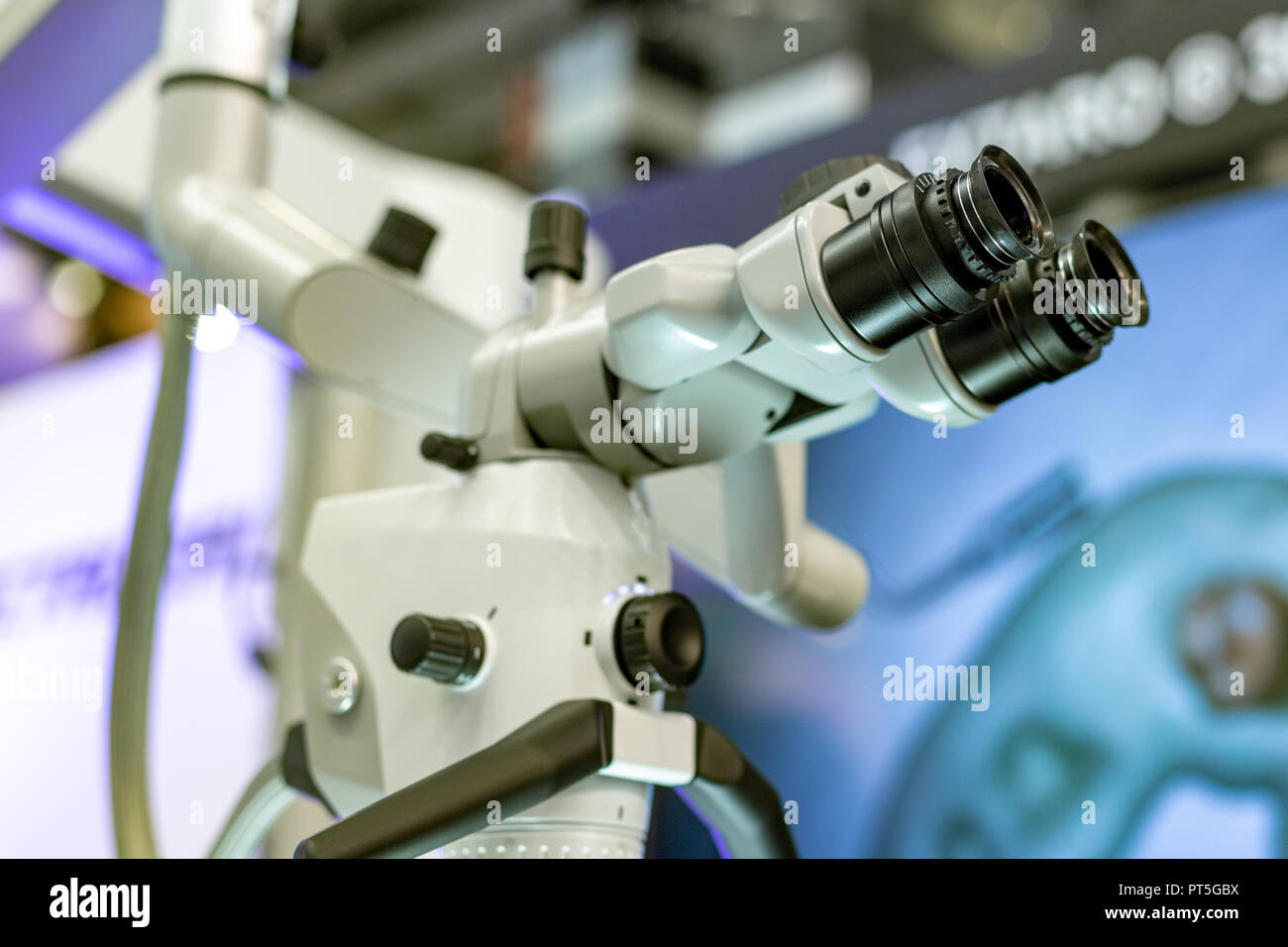 Dental microscope on the background of modern dentistry. Medical ...