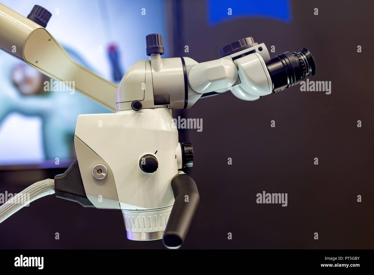 Dental microscope on the background of modern dentistry. Medical ...