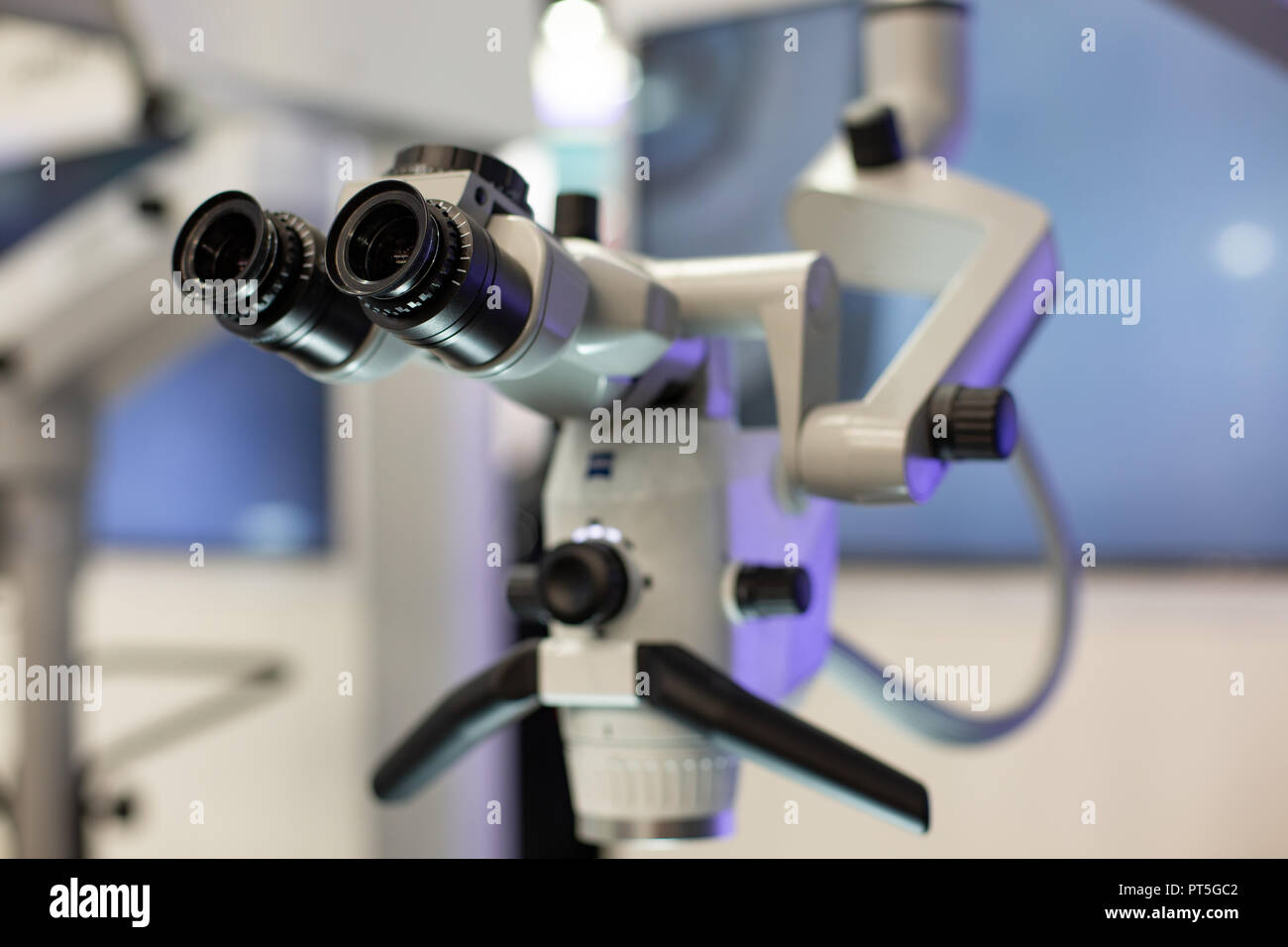 Dental microscope on the background of modern dentistry. Medical ...