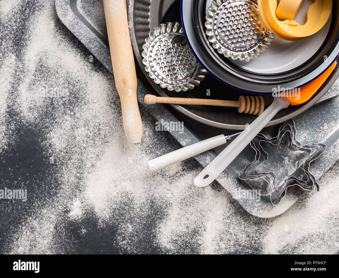 Baking utensils and accessories, cake tins. Christmas dark background ...