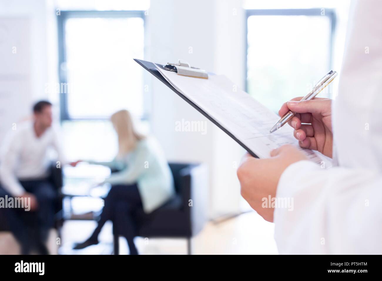 Doctor patient male notes hi-res stock photography and images - Alamy