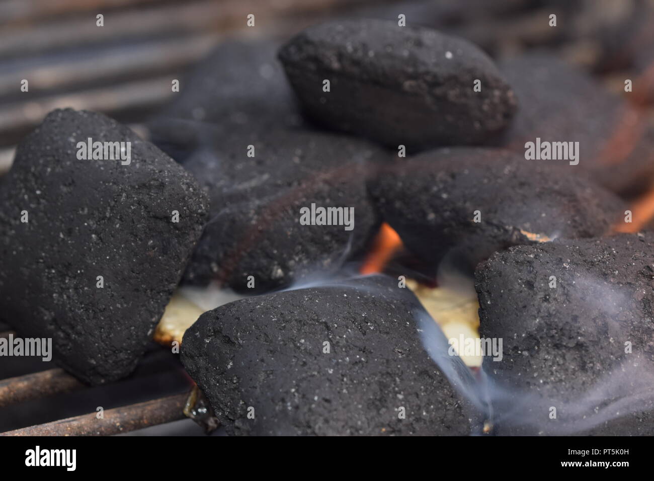 Camp fire coals Stock Photo - Alamy